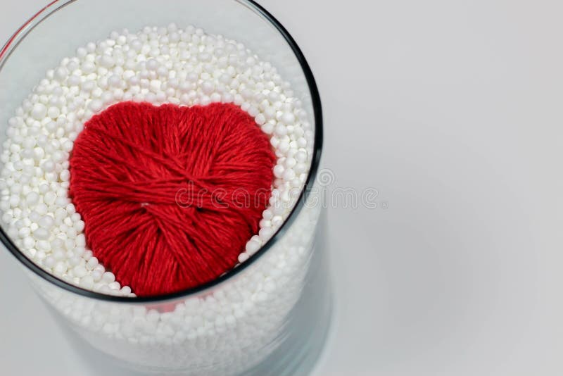Heart Made Wool Yarn, Protected by Expanded Polystyrene Pellets Stock ...