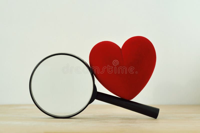 Heart with Magnifying Glass - Concept of Searching Love Stock Photo ...