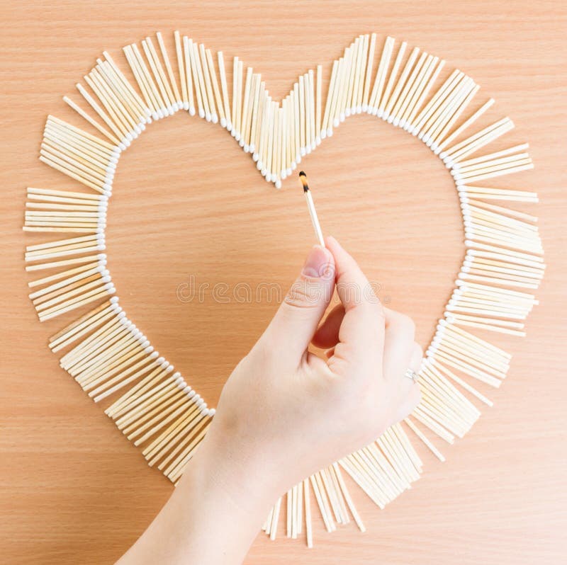Heart of matches and fire. stock image. Image of flame - 33570571