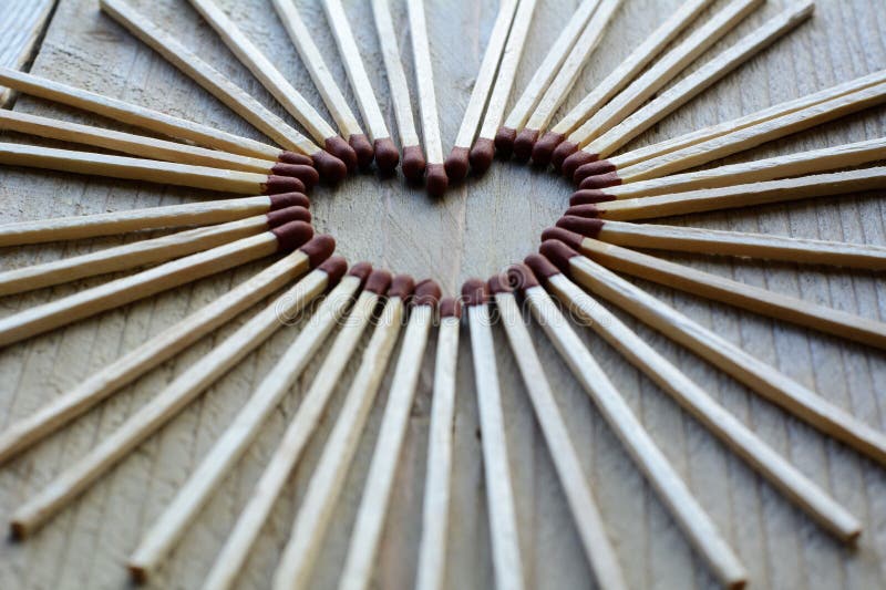 Heart from Matches on the Wooden Background. Many Long Matches Stock ...