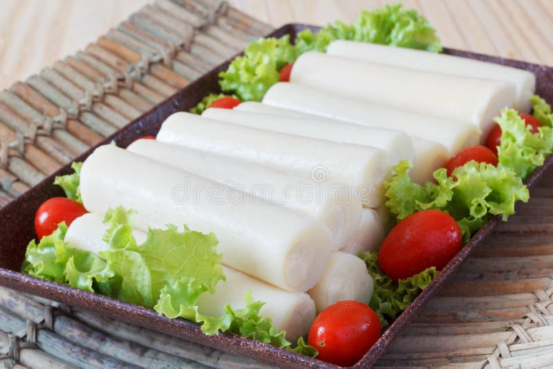 Heart of Palm (palmito) with Cherry Tomato on Plate Stock Photo - Image ...