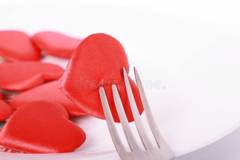 Heart pierced by fork stock photo. Image of diet, color - 12010490