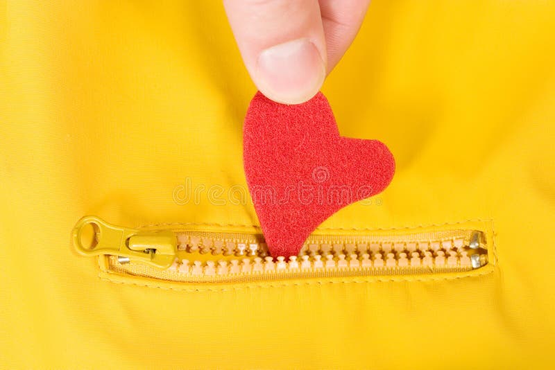 Heart in a pocket stock image. Image of hand, detail, heart - 6959185