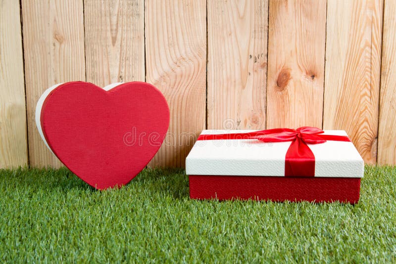 Heart and Present Box on Green Grass Stock Photo - Image of grass ...
