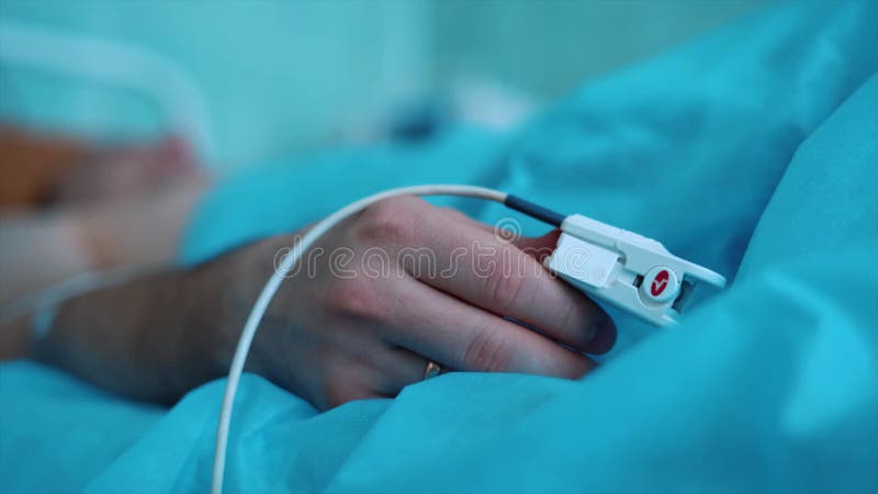 Heart Rate Sensor on the Patient`s Finger Close-up Stock Video - Video ...