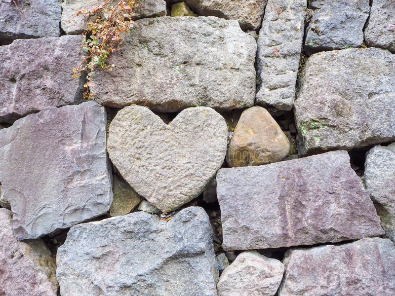Heart rock wall stock image. Image of heartshaped, rough - 67186849