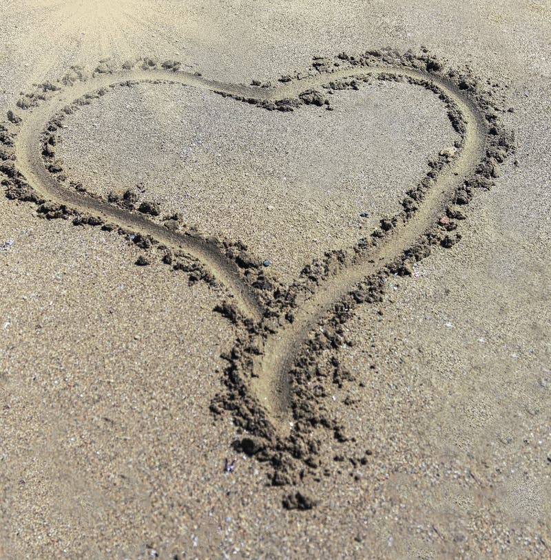 Heart on sand stock photo. Image of romance, grain, loving - 93796926
