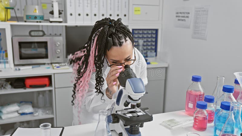 In the Heart of Science, Beautiful Young Hispanic Scientist Immersed in ...