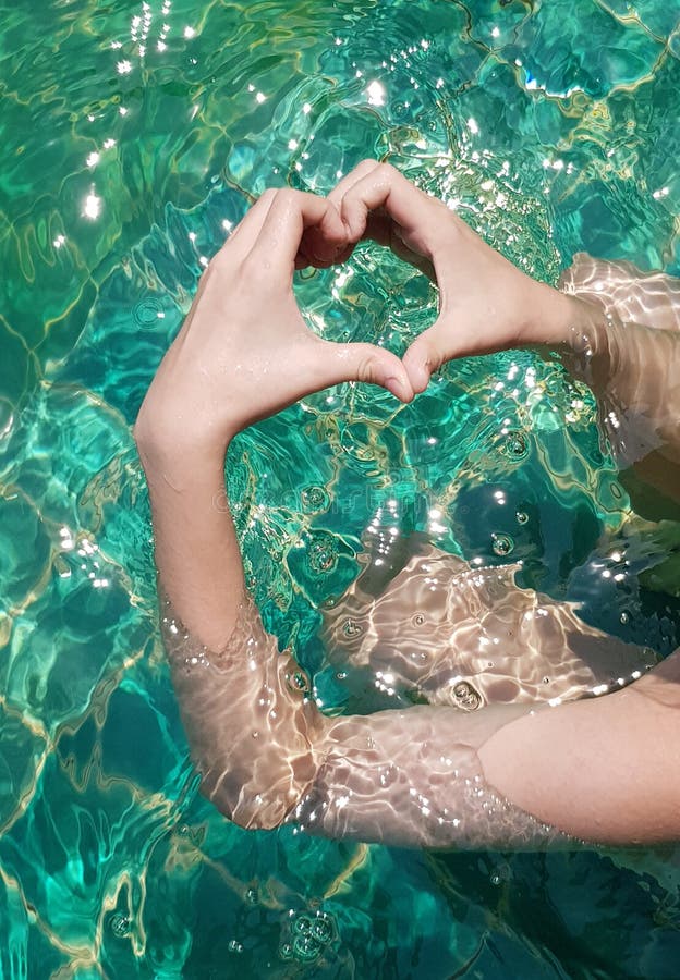 Heart Shape Hands in the Pool Stock Image - Image of pool, beautiful ...
