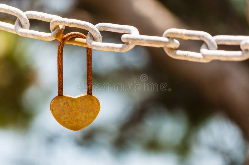 Heart Shape Rusty Love Lock Hanging on a Metal Chain Stock Photo ...