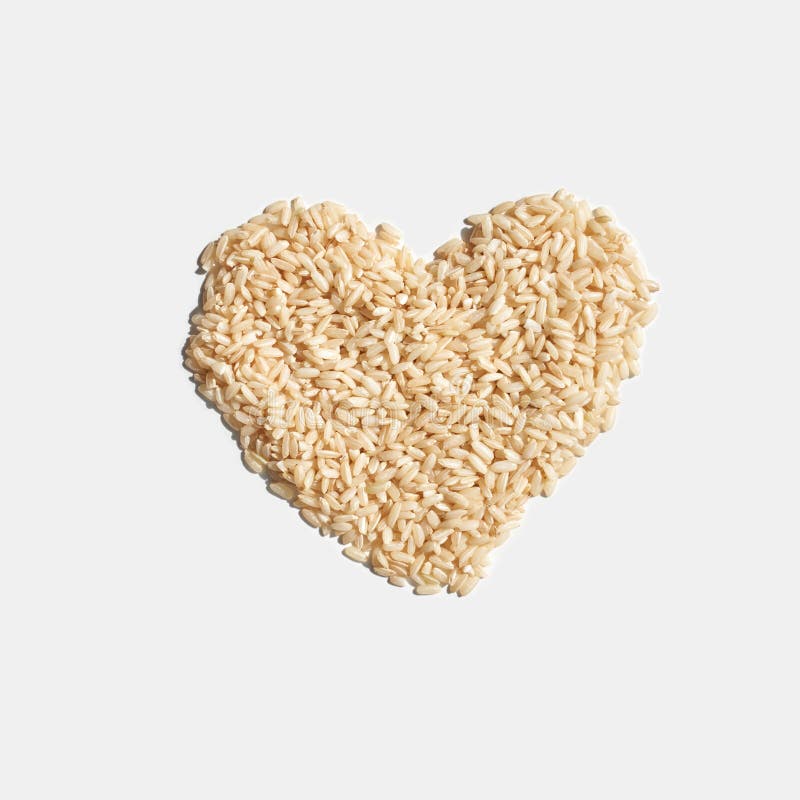 Heart Shape Made of Uncooked Rice Grains on White Background Stock ...