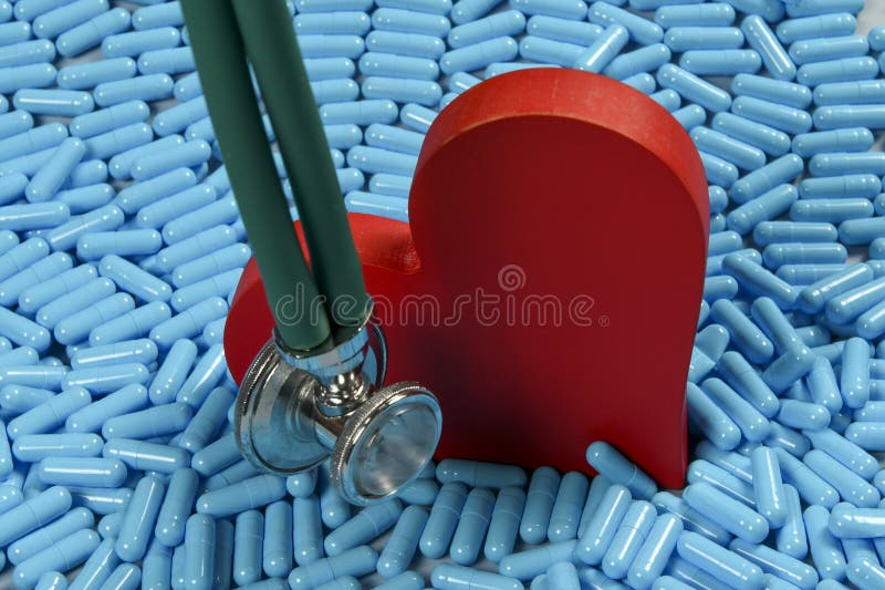 Heart Shape and Medicine Capsules Representing Heart Problems and ...