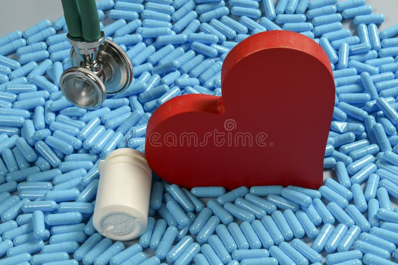 Heart Shape and Medicine Capsules Representing Heart Problems and ...