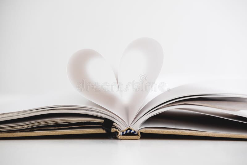 Heart Shape in Opened Notebook Page, on Wooden Table Stock Photo ...