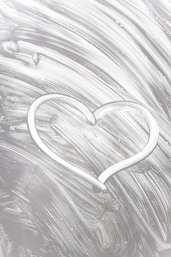 Heart Shape Painted on Soap Suds on the Window Pane Stock Image - Image ...