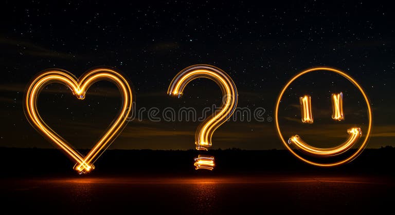 Heart Shape, Question Mark, and Smiley Face Created Using Orange Light ...