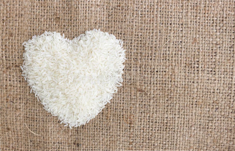 Heart Shape Rice Grains on Old Sack Background. Stock Image - Image of ...