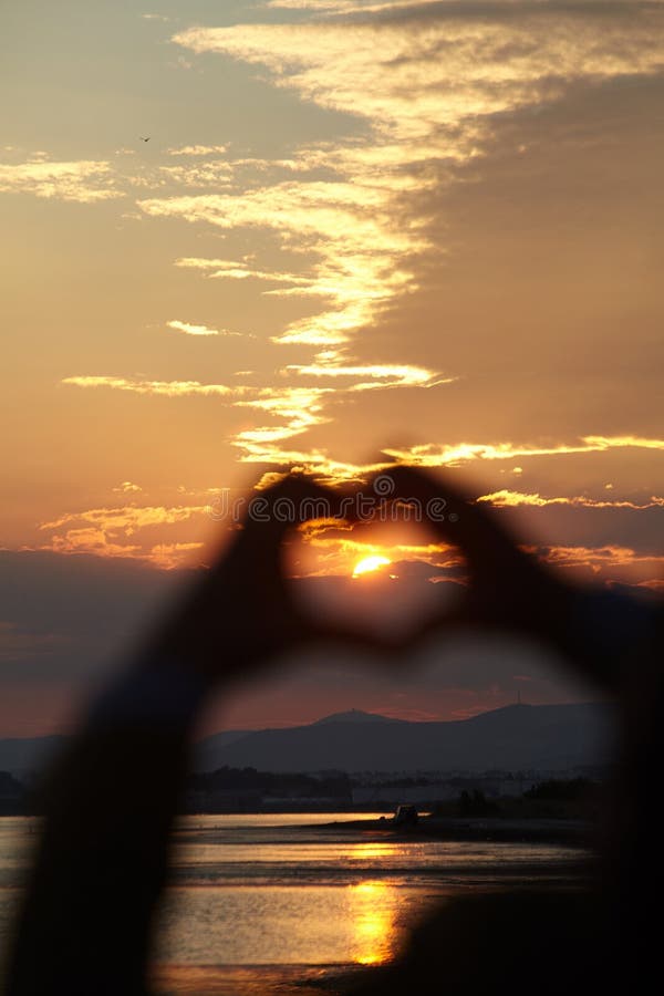 Heart Shape Silhouette on Sunset. Stock Photo - Image of ocean, horizon ...