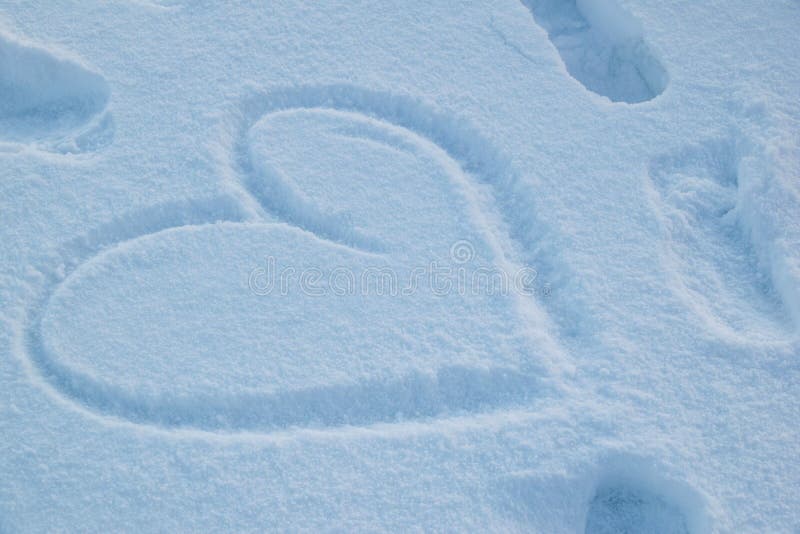 Heart shape in the snow. stock image. Image of background - 265679145