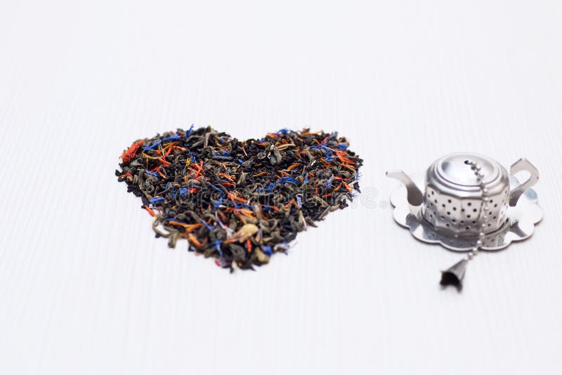 Heart Shape of the Tea Leaves on a White Table at Home Stock Photo ...