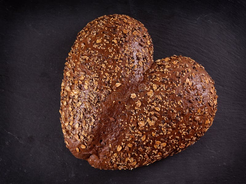 Heart shaped bread loaf stock photo. Image of breakfast - 180280726