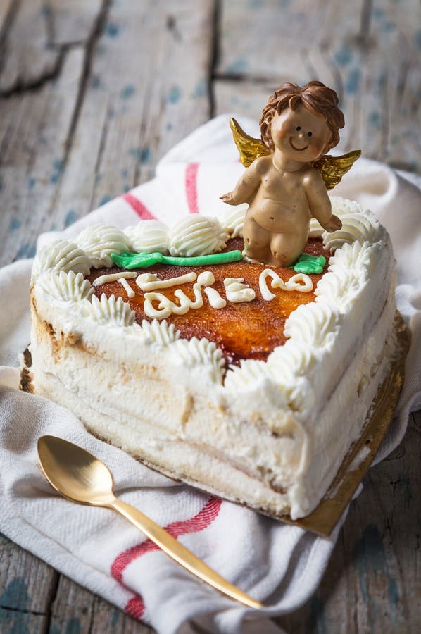 Heart Shaped Cake with Smiling Angel Stock Image - Image of food ...