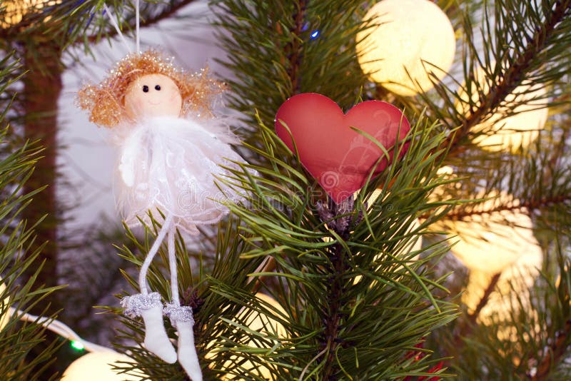 Heart Shaped Card and Angel on Christmas Tree Stock Photo - Image of ...
