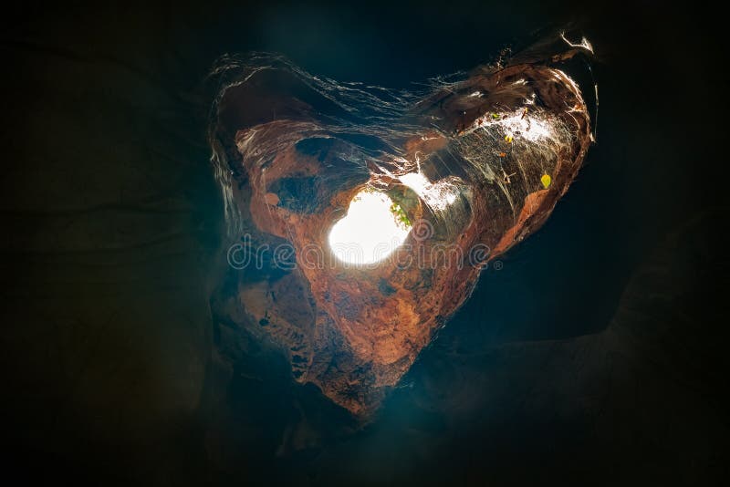 Heart-shaped cave stock photo. Image of mystical, beam - 79082414