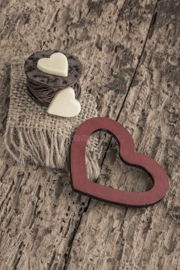 Heart Shaped Chocolate Bars on Wooden Table Stock Photo - Image of ...