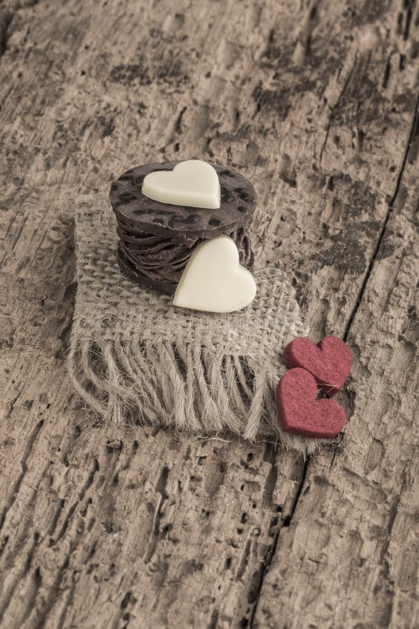 Heart Shaped Chocolate Bars on Wooden Table Stock Image - Image of dark ...