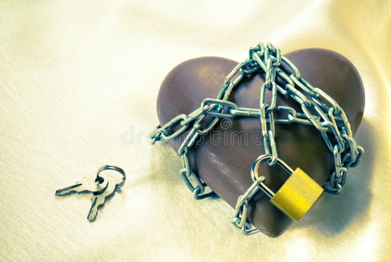 Heart Shaped Chocolate Tied Up with Chains Stock Photo - Image of lock ...