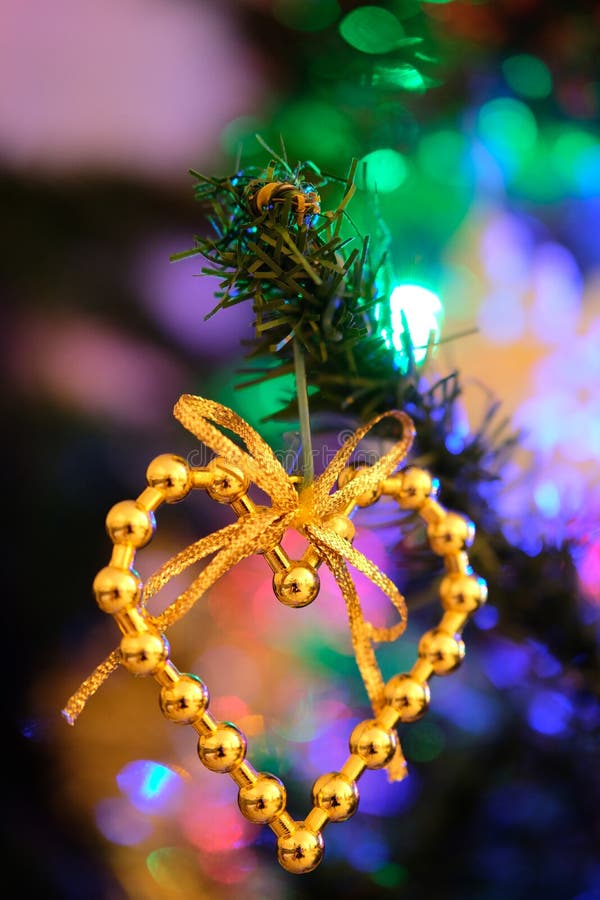 Heart Shaped Christmas Decoration Hanging on a Nicely Illuminated ...