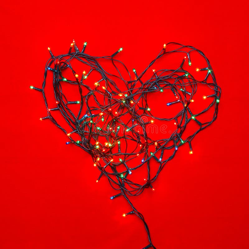 Heart Shaped Christmas Lights on Red Stock Image - Image of lights ...
