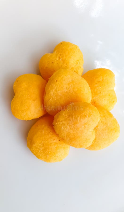 Heart Shaped Corn Crackers with a Delicious Cheese Flavor Stock Photo ...