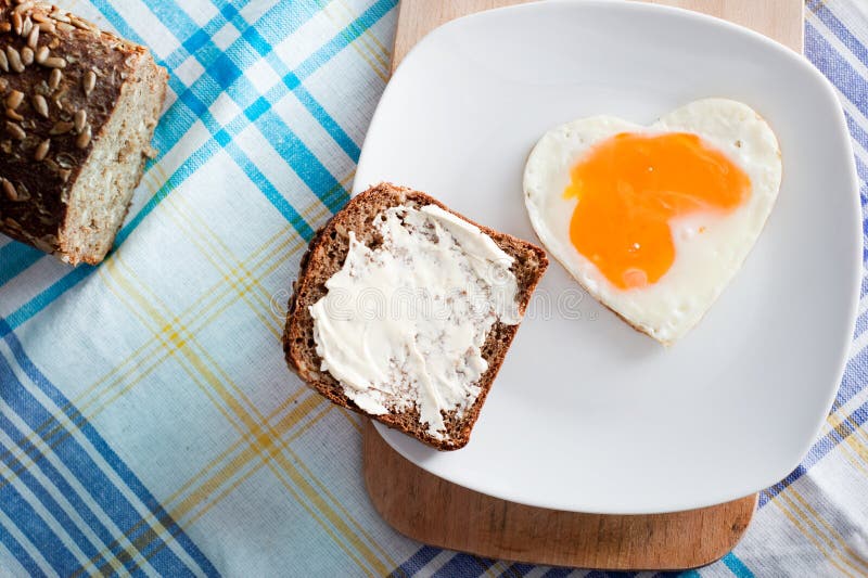 Heart Shaped Egg on Breakfast Stock Photo - Image of wood, shape: 30392600
