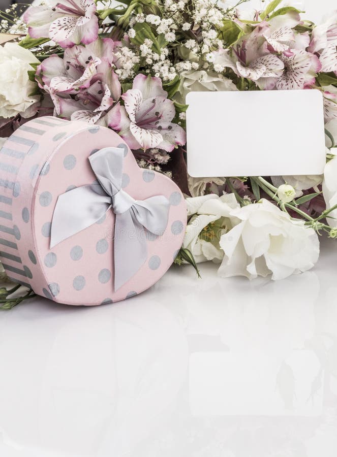 Heart Shaped Gift Box and Flowers with a Name Tag Stock Photo - Image ...