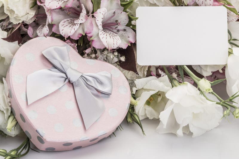 Heart Shaped Gift Box and Flowers with a Name Tag Stock Photo - Image ...