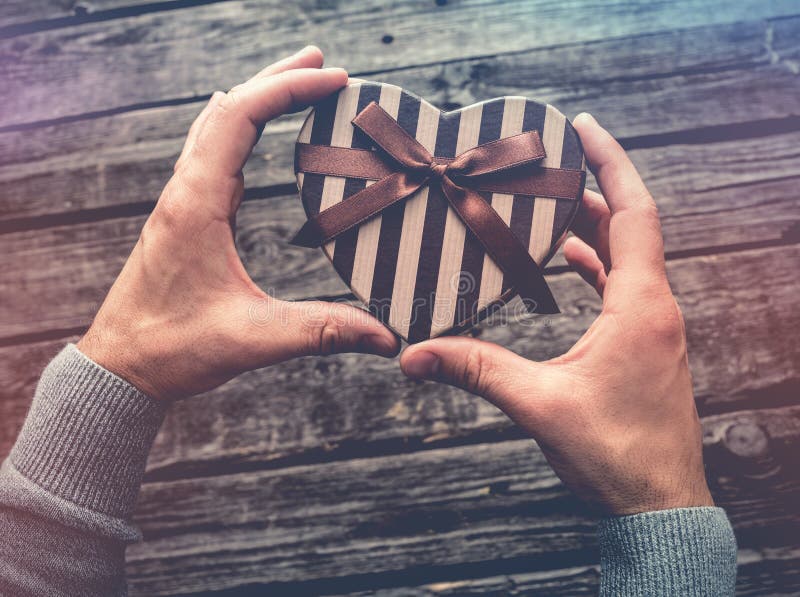 Heart Shaped Gift Box in Man`s Hands. Stock Photo - Image of ribbon ...