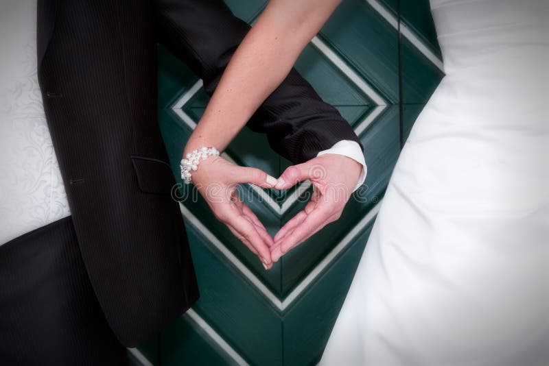 Heart Shaped Hands of Bride and Groom on Wedding Stock Image - Image of ...