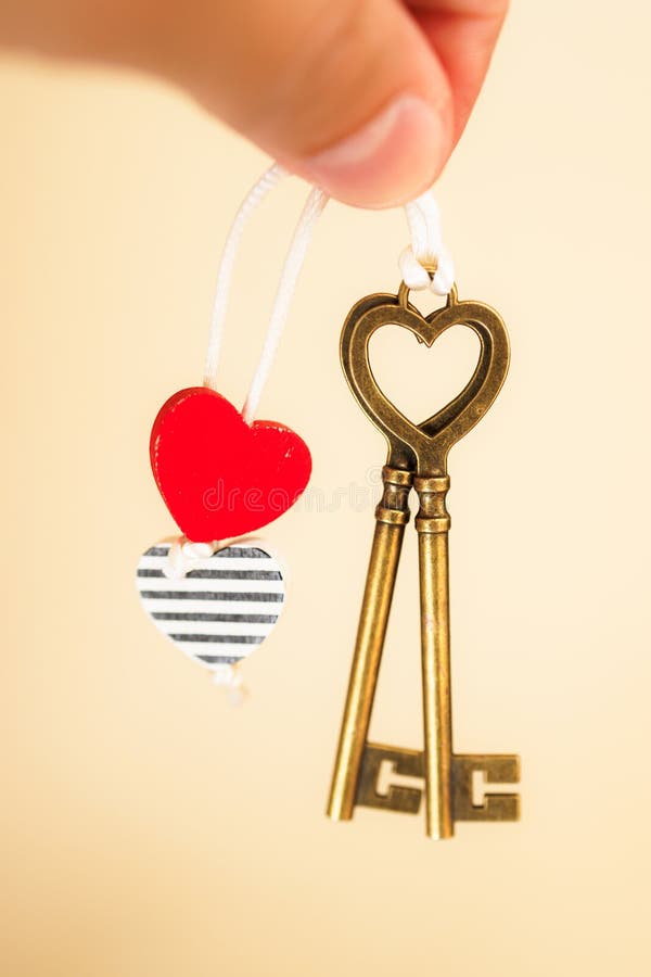 Heart-Shaped Vintage Skeleton Keys and Heart Charms on String Being ...