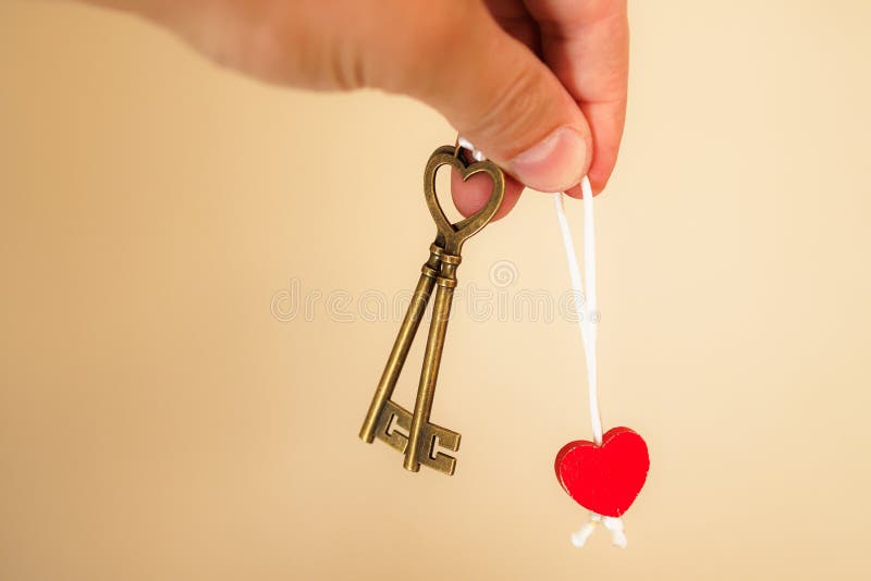 Heart-Shaped Vintage Skeletopn Keys and Heart Charms on String Being ...