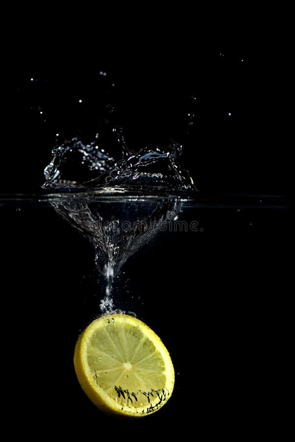 Heart shaped lemon splash stock photo. Image of background - 10054134