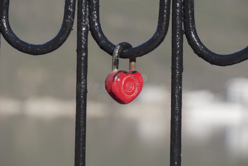 Heart Shaped Love Padlock. Heart-shaped Lock on the Bridge Stock Image ...