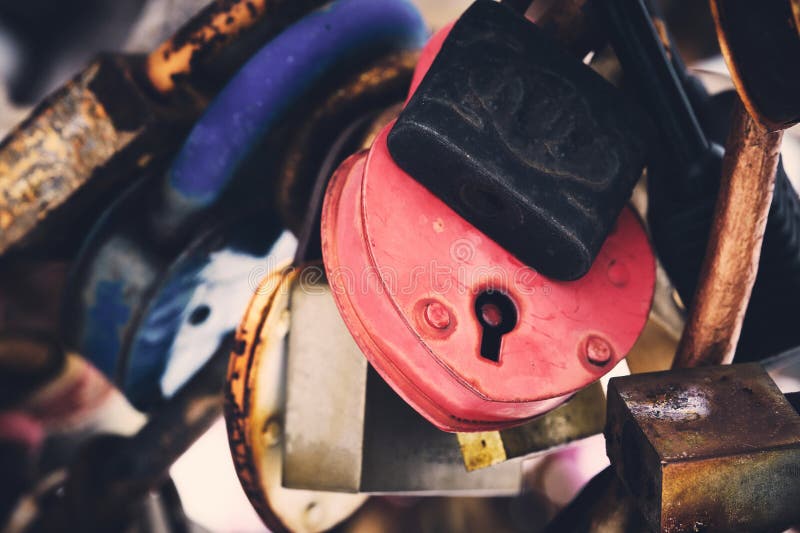 Heart Shaped Padlock among Many Old Rusty Locks. Stock Photo - Image of ...