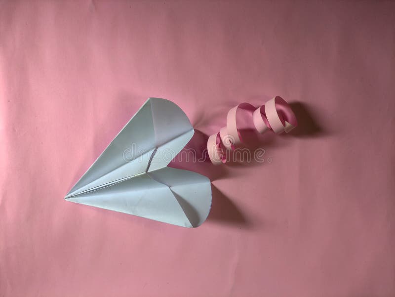Heart Shaped Paper Airplane on Colored Background. Valentines Day ...