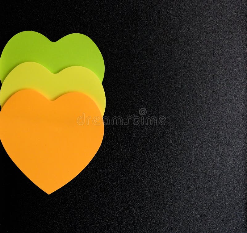 Heart-shaped Paper Notes in Bright Orange, Lime Green, and Light Green ...