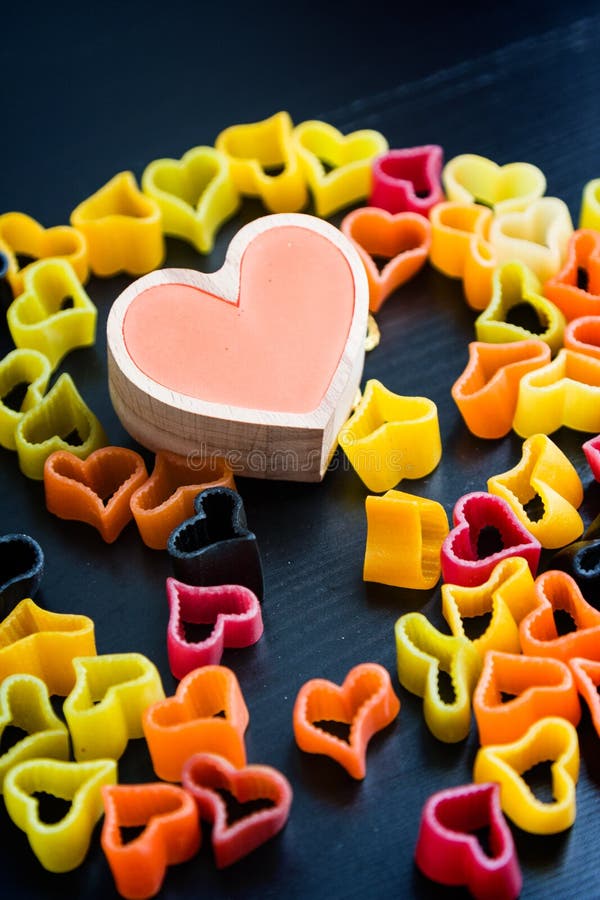 Heart-shaped Pasta on Black Table Stock Photo - Image of lovely, pastry ...
