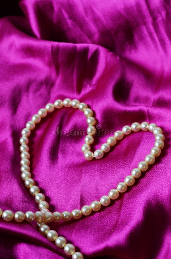 Heart Shaped Pearl Necklace Stock Photo - Image of drapery, satin: 45301362