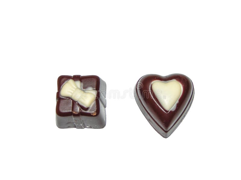 A Heart Shaped Piece of Chocolate and a Gift Box Shaped Piece of ...