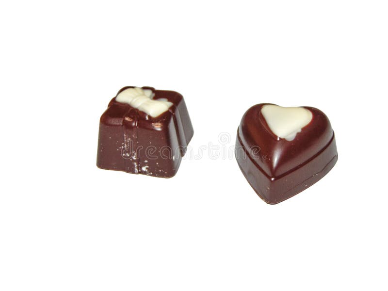 A Heart Shaped Piece of Chocolate and a Gift Box Shaped Piece of ...